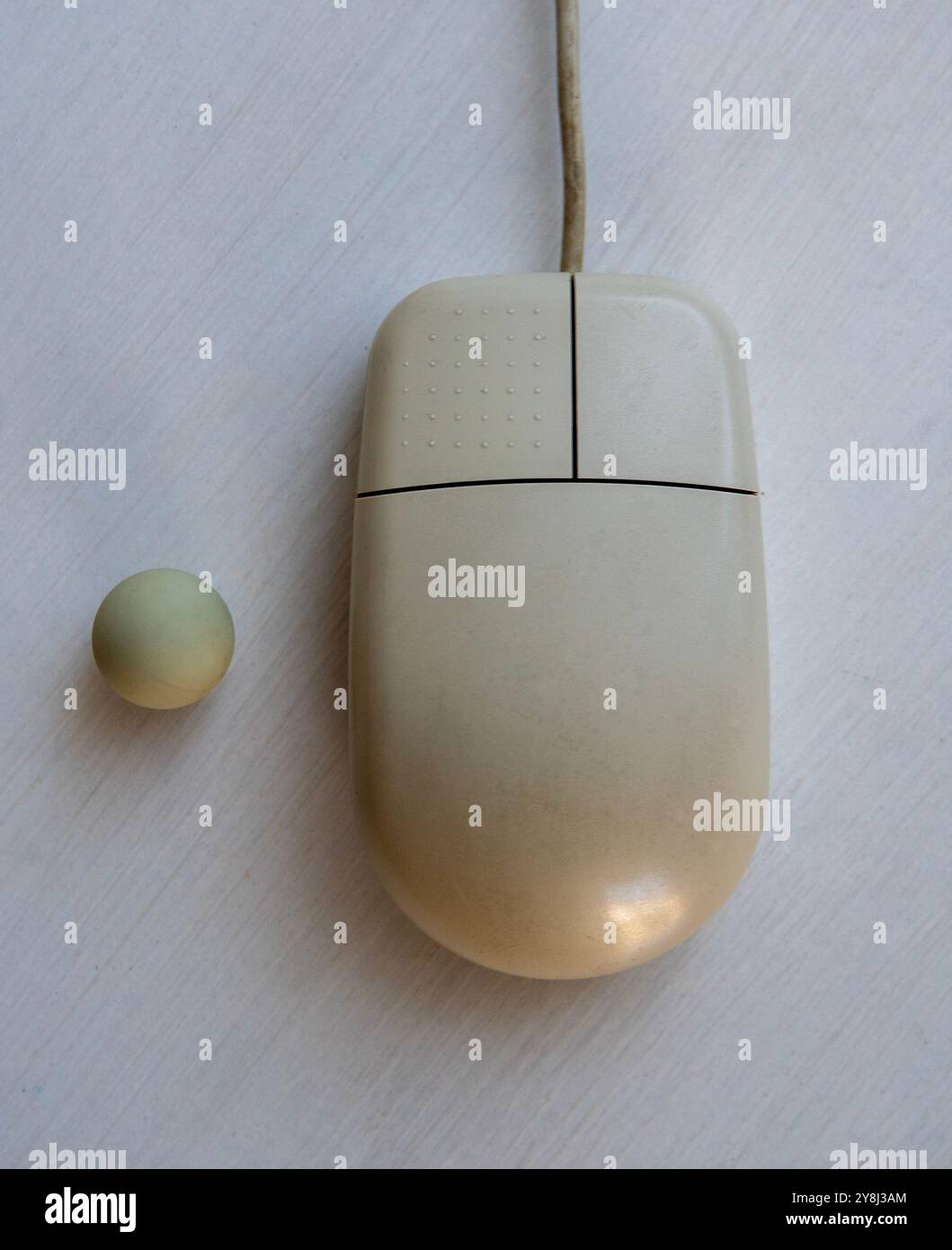 Old computer mouse running on the principle of a ball on a table ...