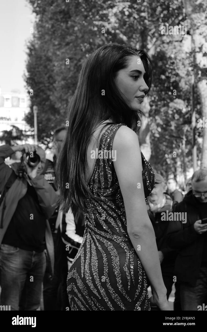 Ghioaca Andreea-Roxana wearing a sparkling dark blue dress with a puch ...
