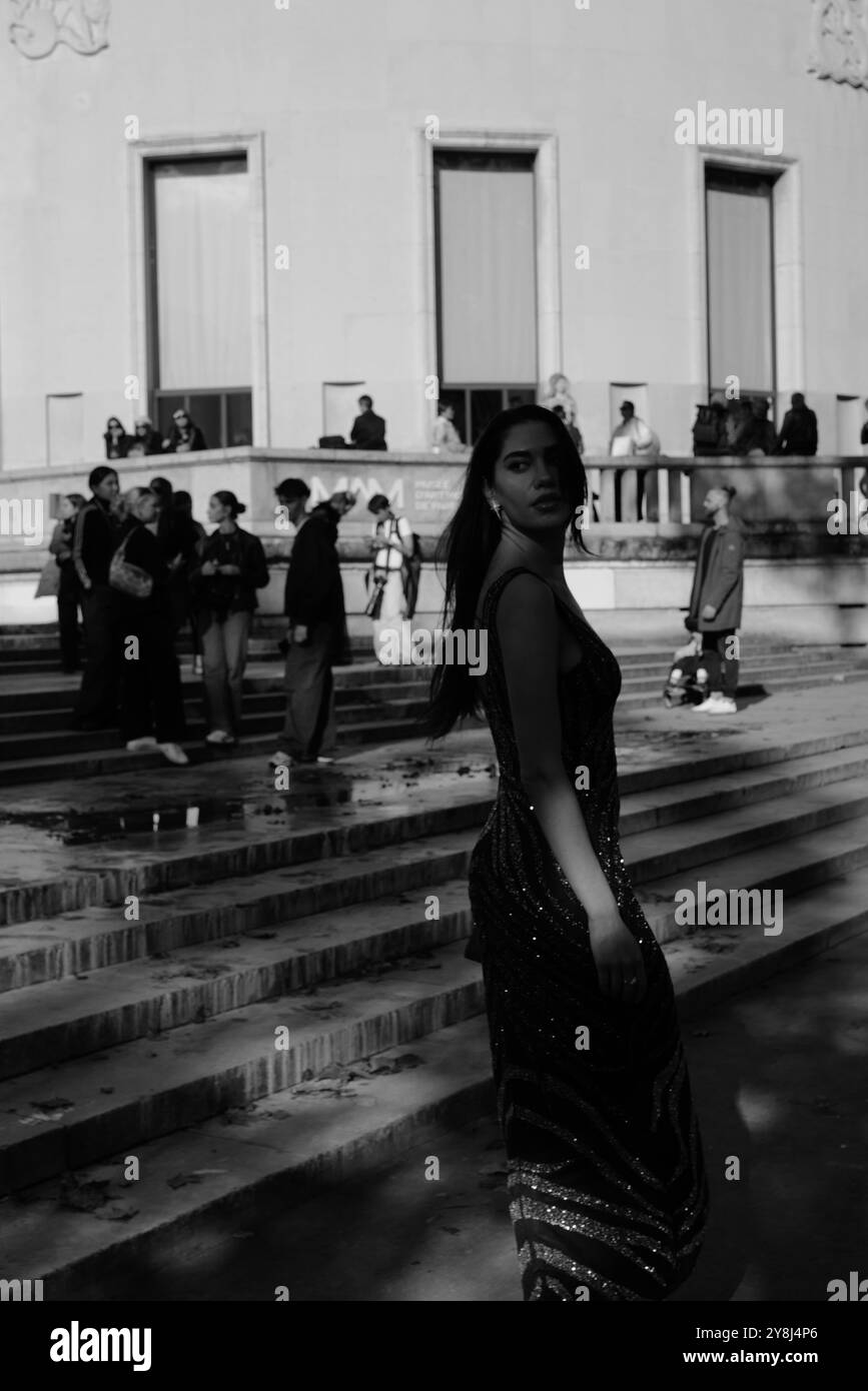 Ghioaca Andreea-Roxana wearing a sparkling dark blue dress with a puch ...