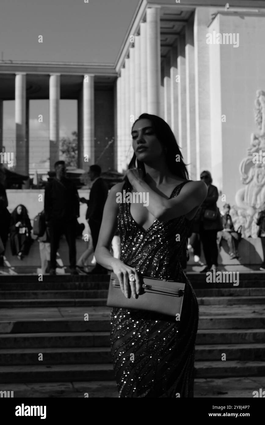 Ghioaca Andreea-Roxana wearing a sparkling dark blue dress with a puch ...