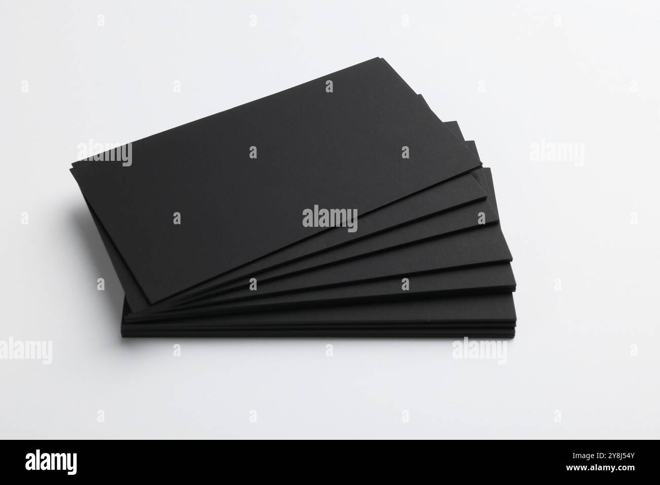 Blank business cards on light grey background. Mockup for design Stock ...