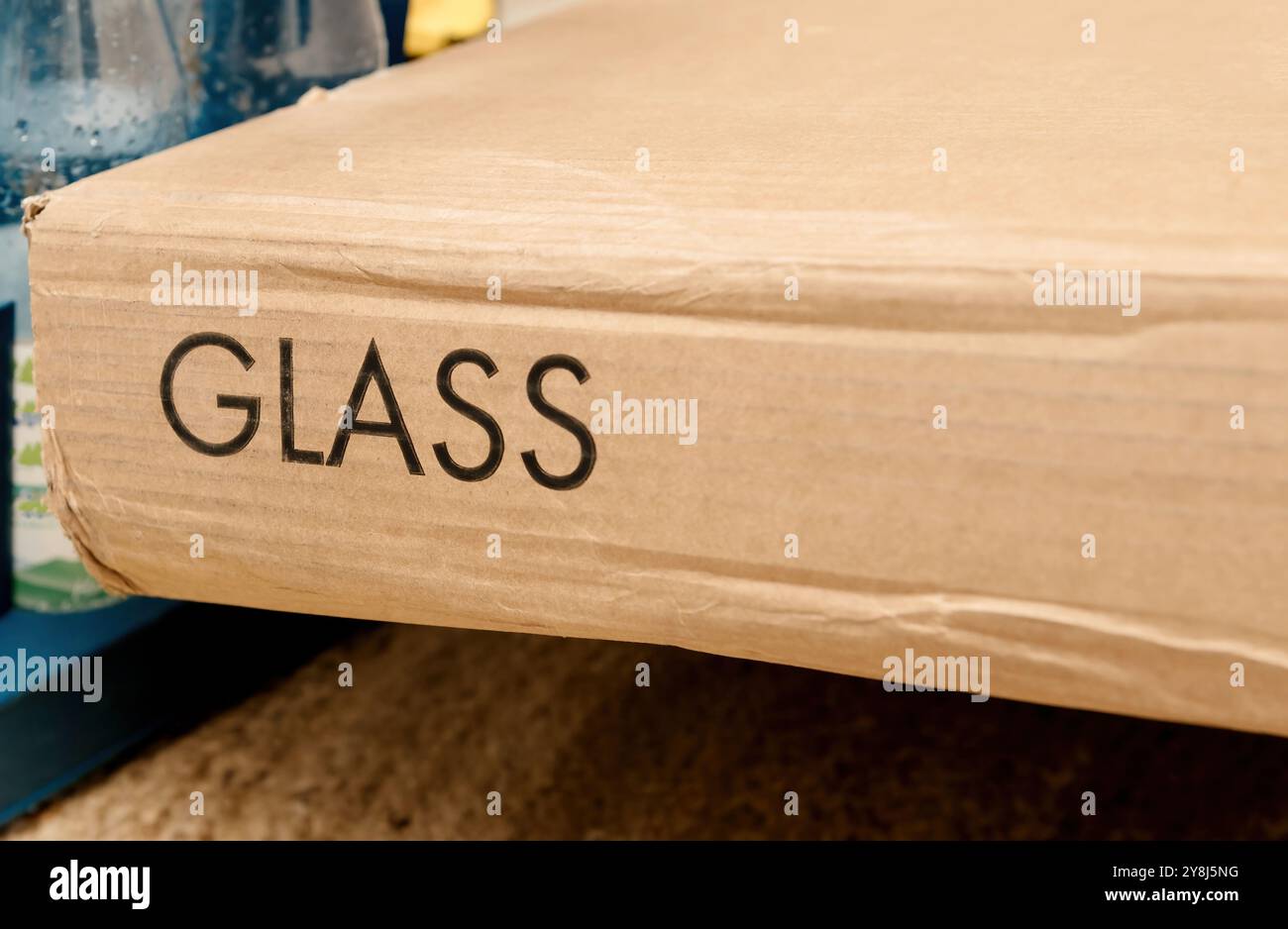 Cardboard package with glass fragile signage, highlighting careful ...