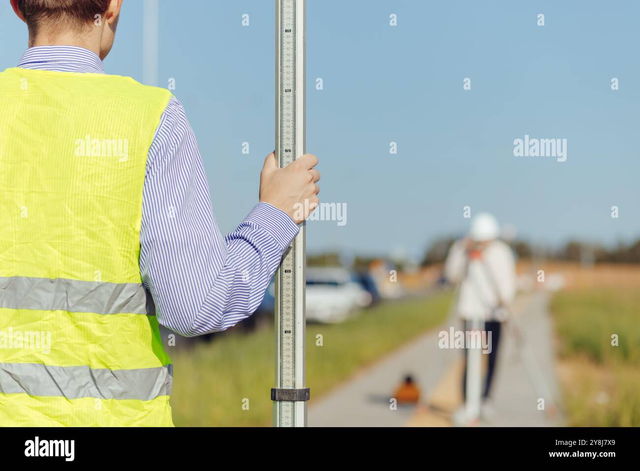 Team survey construction engineer use level survey camera Stock Photo ...