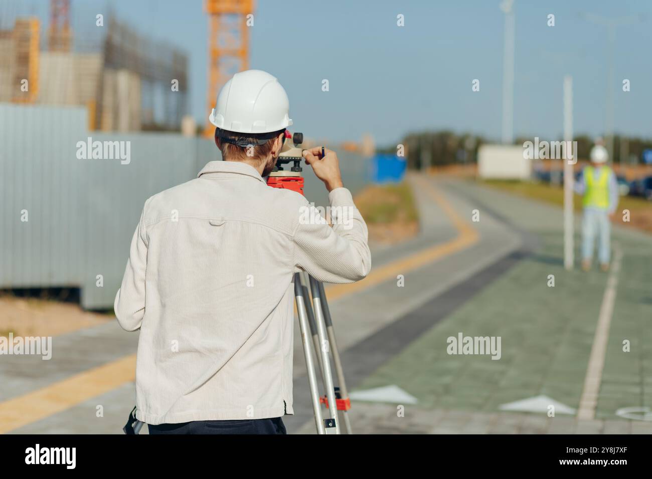Team survey construction engineer use level survey camera Stock Photo ...