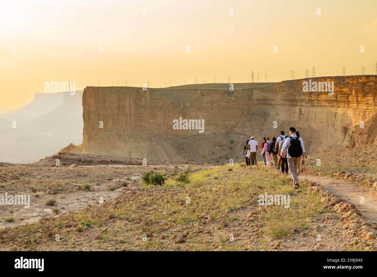 Group of tourist hiking at the Jabal Tuwaiq Mountains, Riyadh, Saudi ...