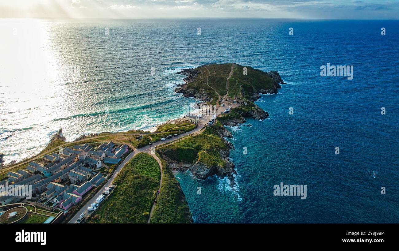 Aerial view of a coastal landscape featuring a peninsula extending into ...