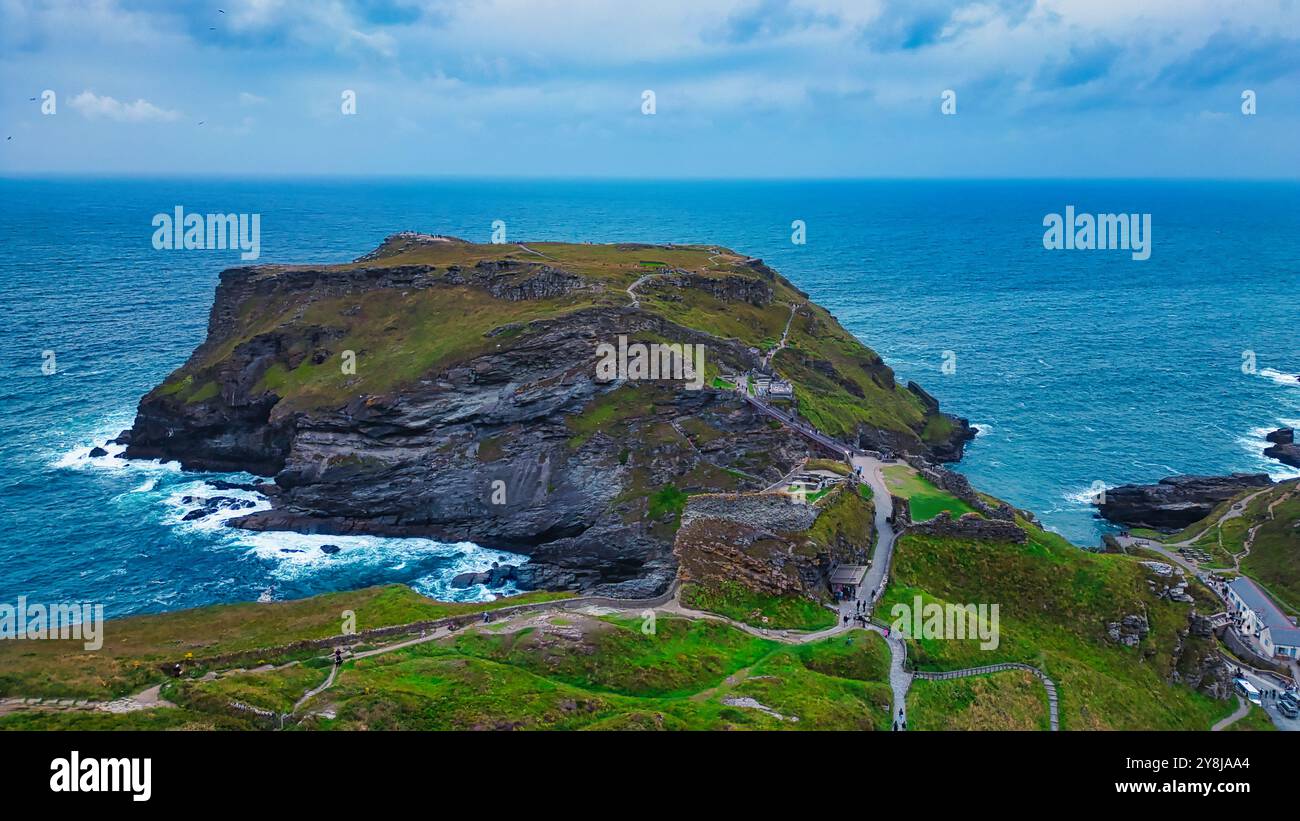 Aerial view of a rugged coastal landscape featuring a rocky island ...
