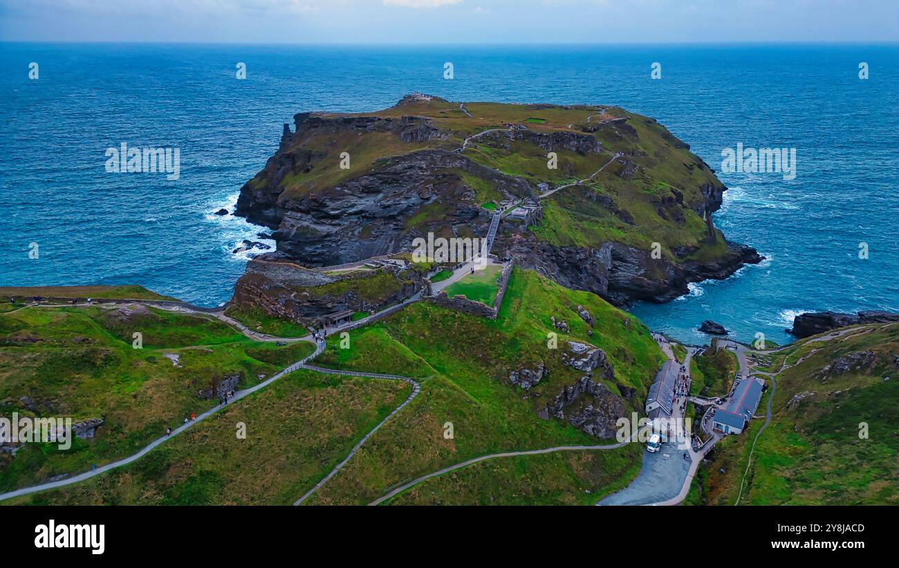 Aerial view of a rugged coastal landscape featuring a rocky island ...