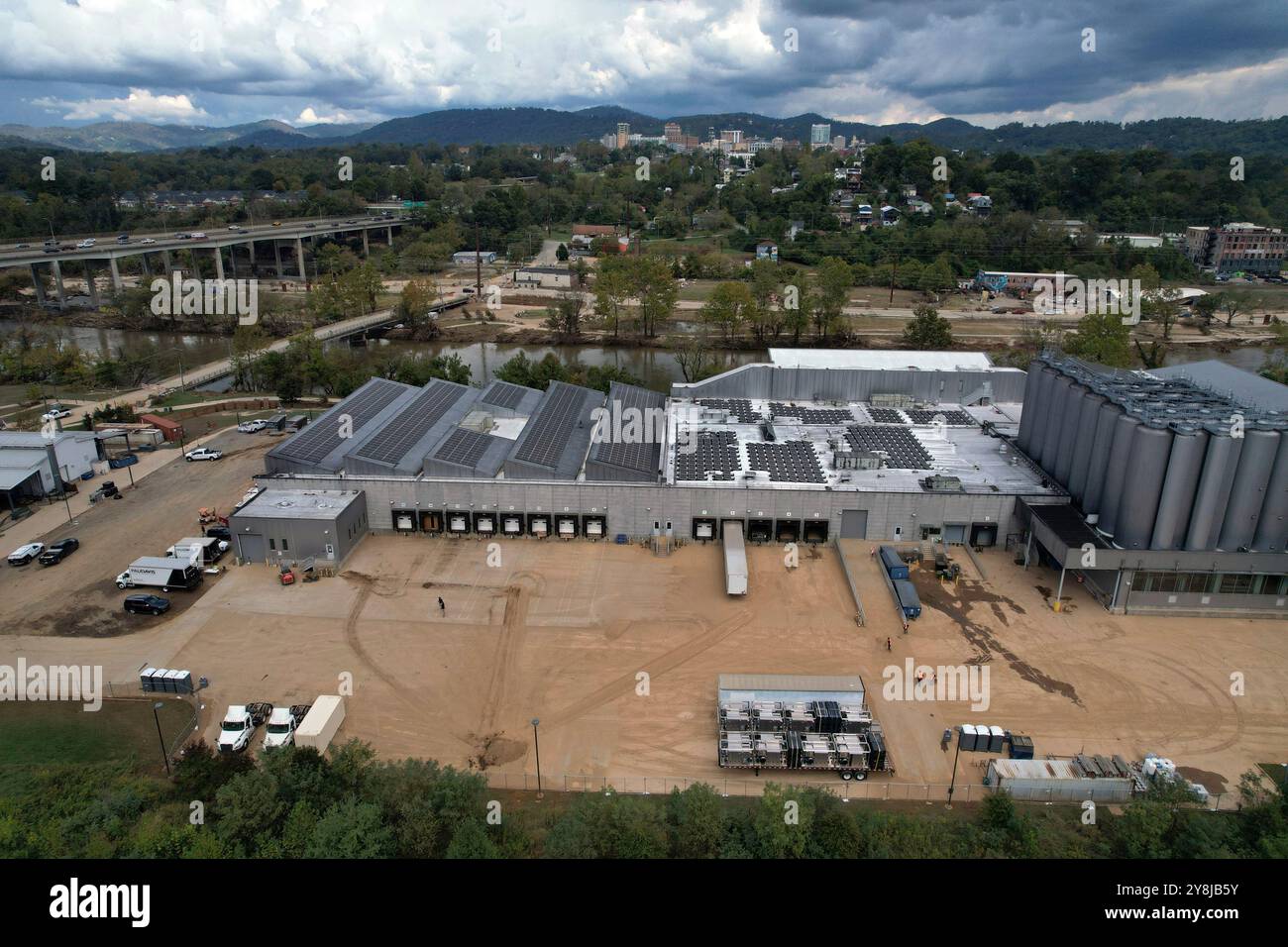 Mud cakes the ground outside New Belgium Brewing Company, Friday, Oct. 4, 2024 in Asheville, N.C ...