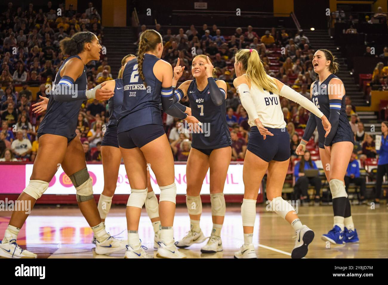 BYU setter Alex Bower (7) celebrates with the team after scoring a ...