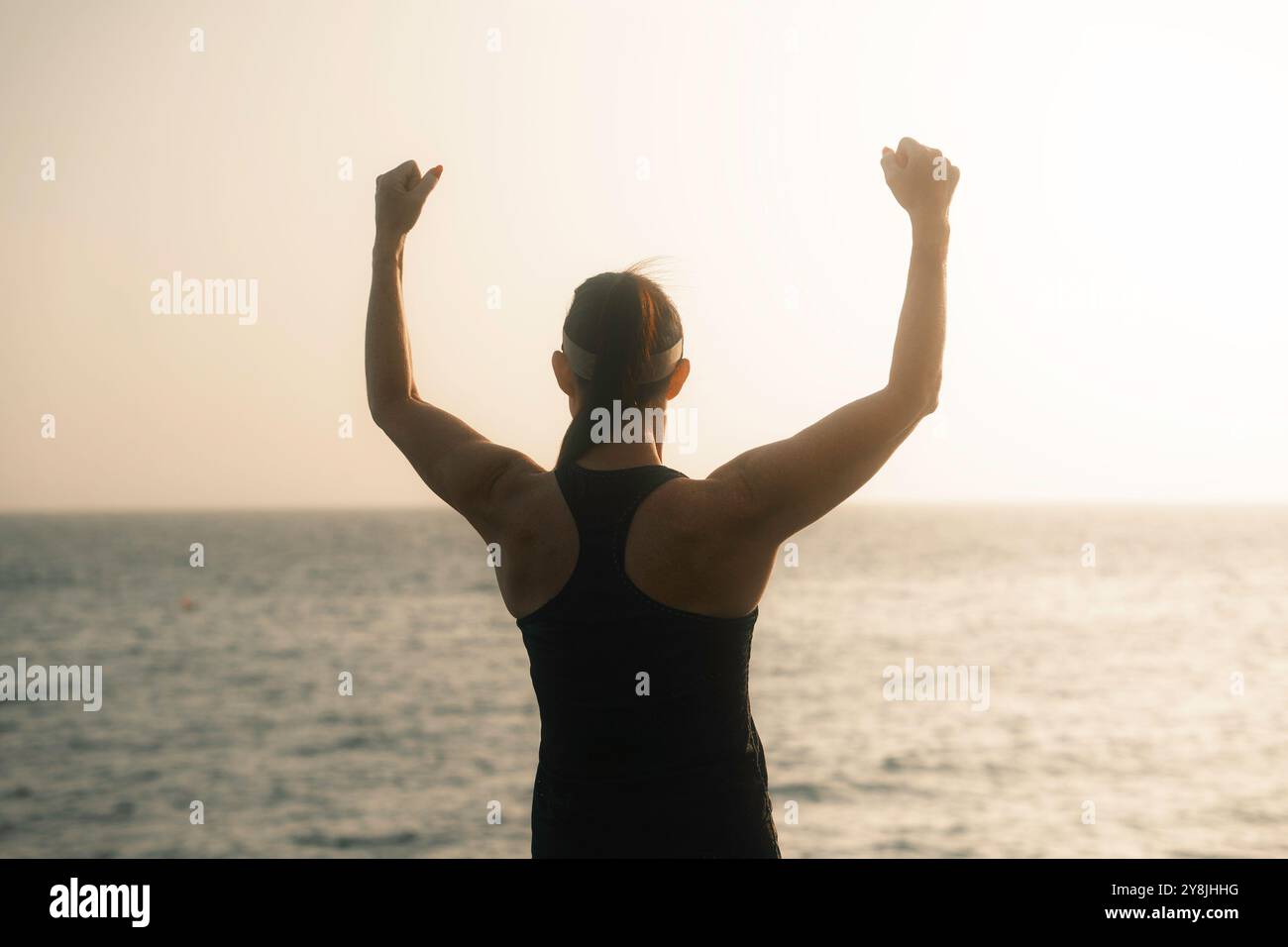 Strong woman, champion success winning female, lady on top of the world ...