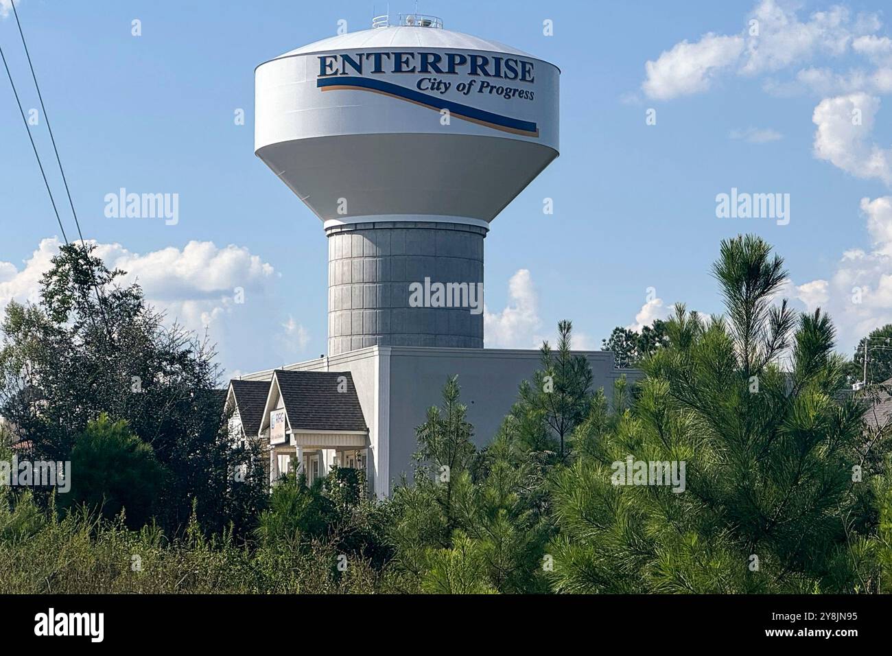 A water tower welcoming drivers into the town of Enterprise, Ala., with ...
