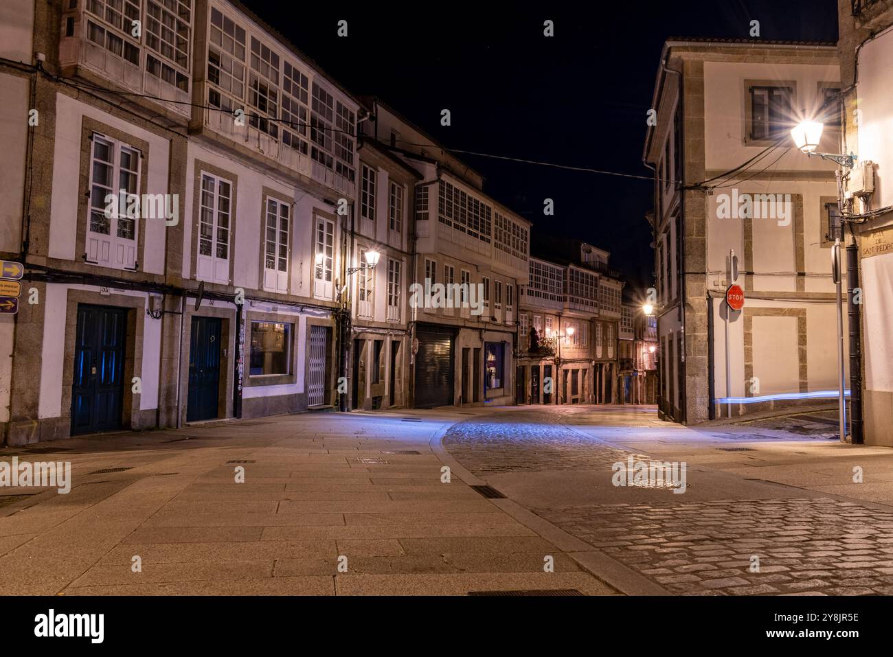 Picturesque Rua de San Pedro street at night with old typical Spanish ...