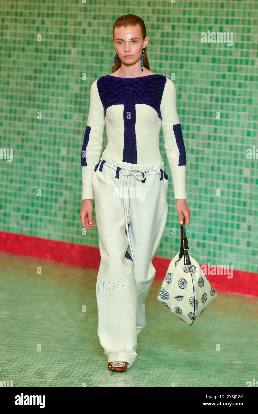 Model Ella Mccutcheon is seen on the catwalk at the Tory Burch fashion show during the Spring ...