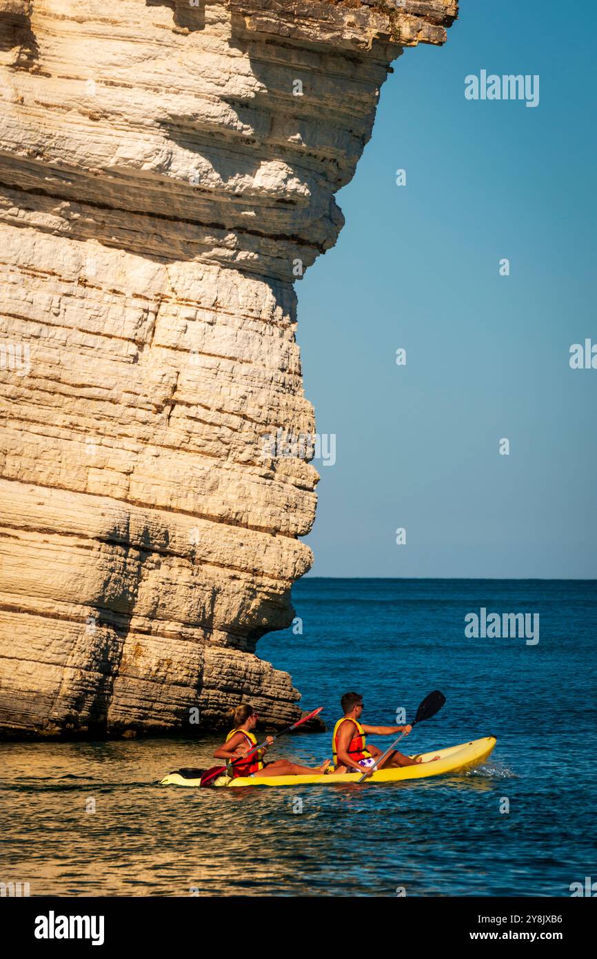 The Zagare bay Stacks. Faraglioni di baia delle Zagare Stock Photo - Alamy