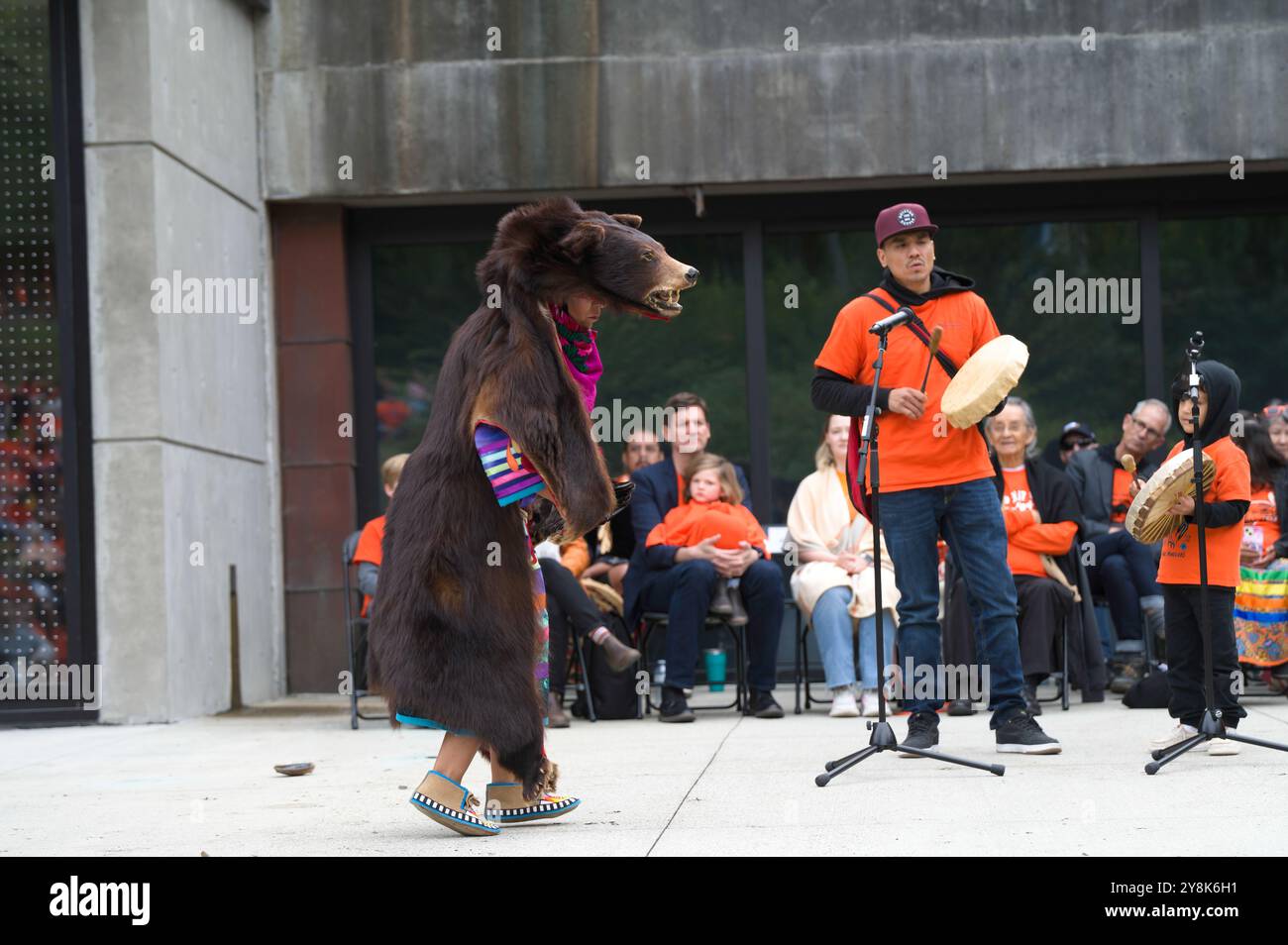 Aileen Michel (Lil'Bear) and Mitchell Tourangeau and his nephew perform ...