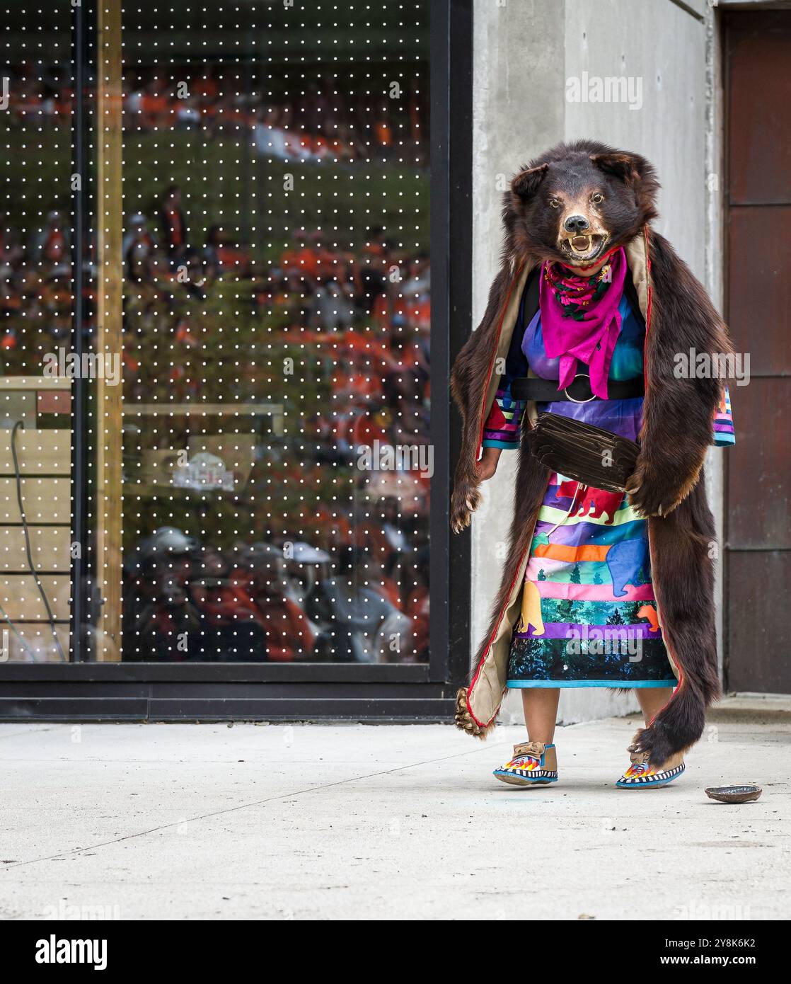 Photo of a First Nation dancer's bear dance regalia at a public Truth ...