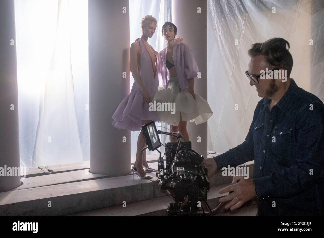 NEW YORK, NEW YORK - SEPTEMBER 08: Models pose backstage during the ...