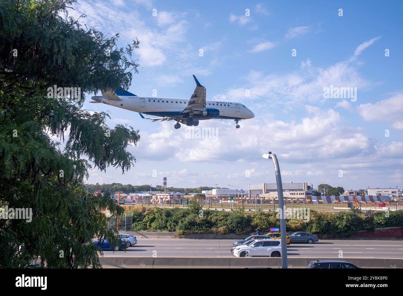 NEW YORK, NEW YORK, USA - SEPTEMBER 20: A Delta Airlines Embraer E175LR ...