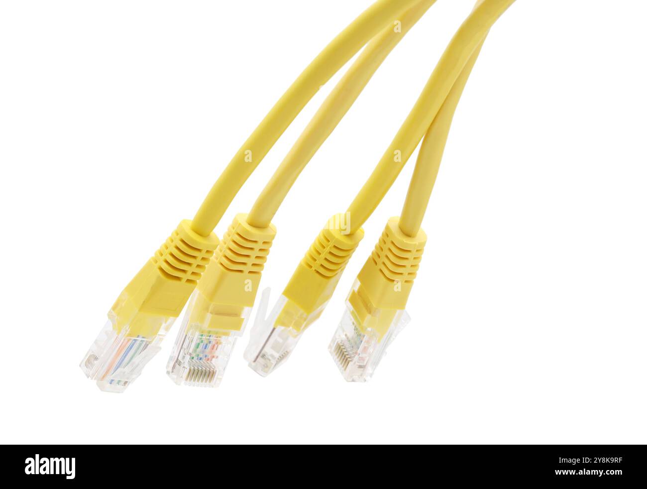 Yellow network cables with molded RJ45 plug isolated on white ...