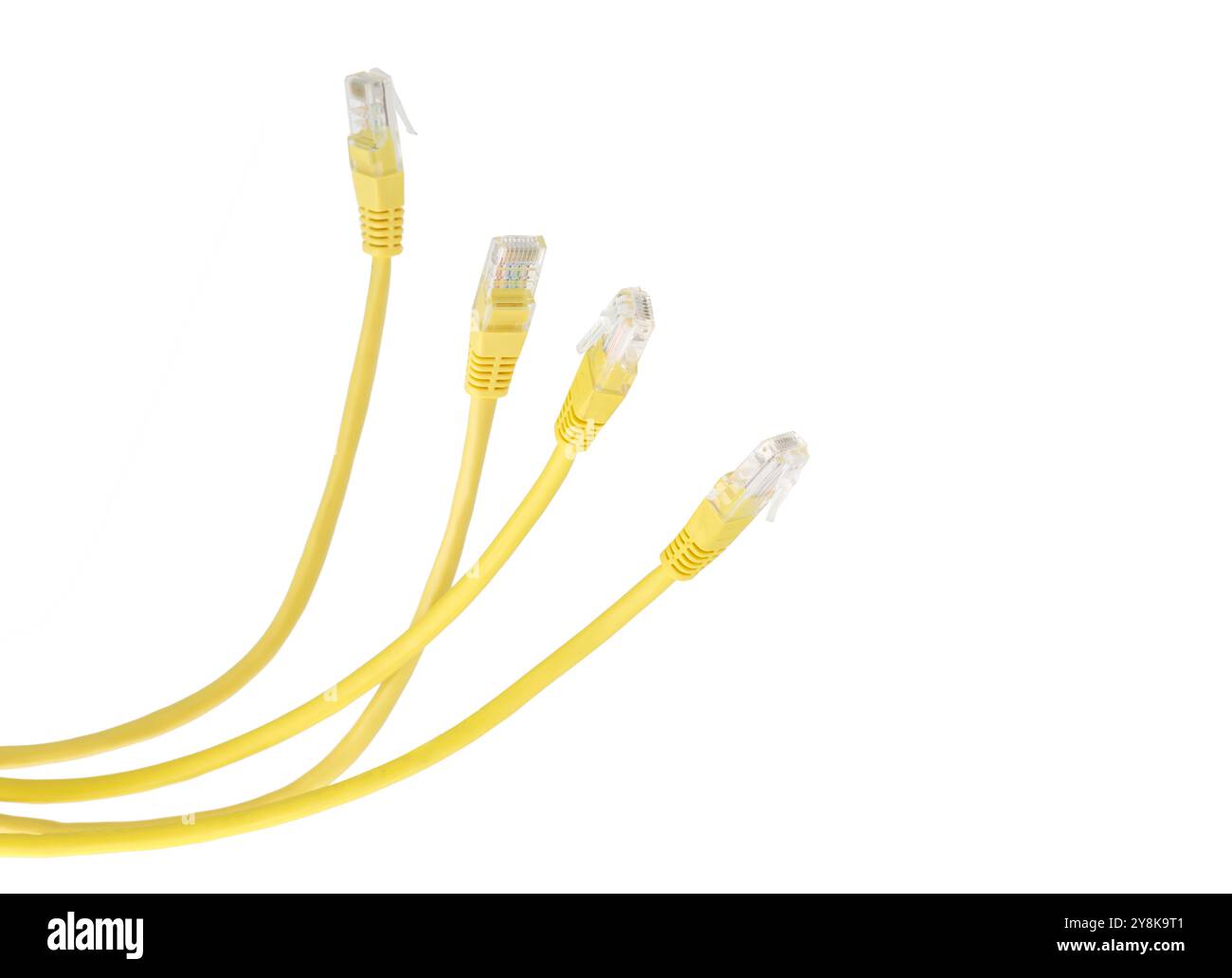 Yellow network cables with molded RJ45 plug isolated on white ...