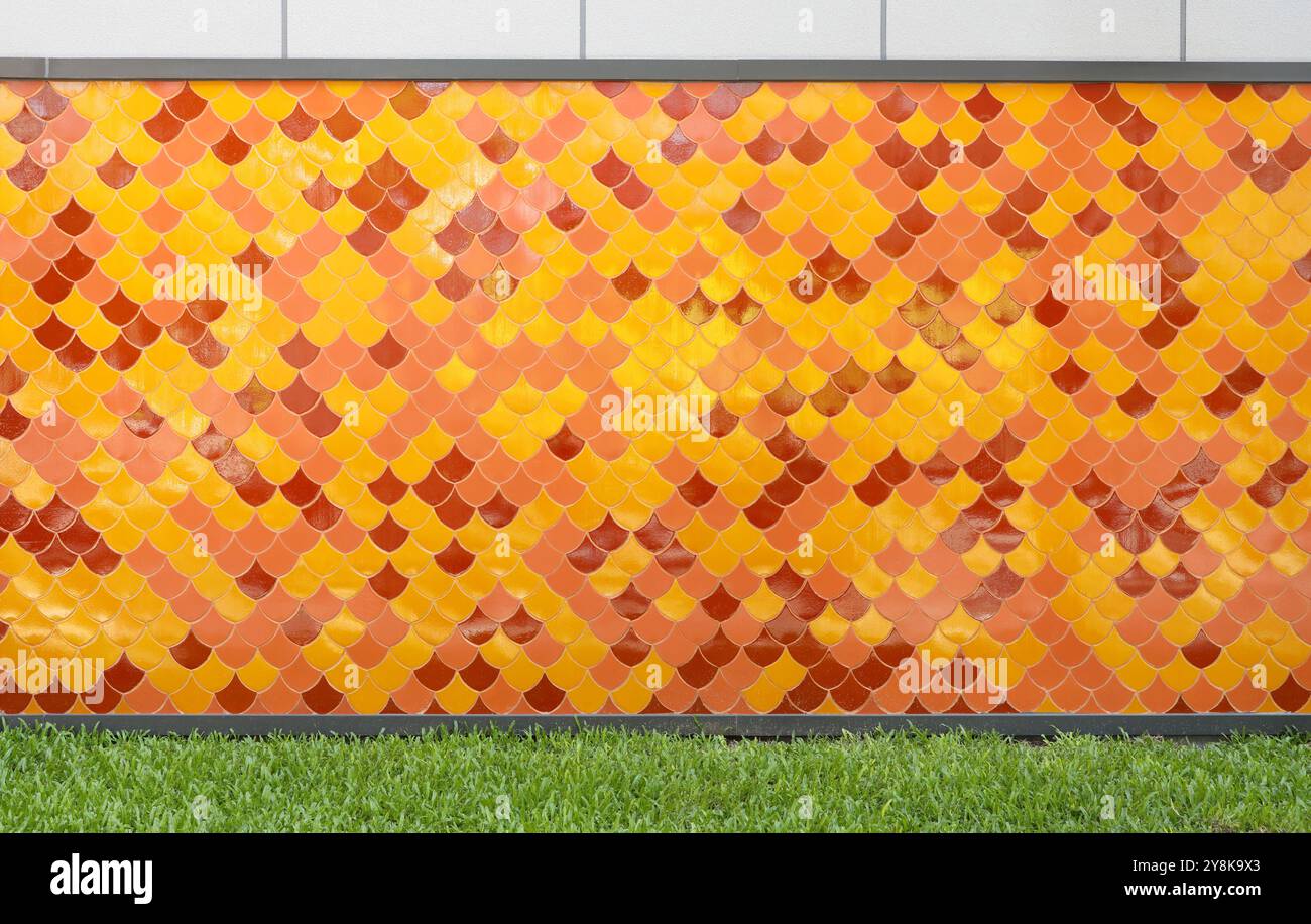 Colorful ceramic tiled wall natural green grass floor Stock Photo - Alamy