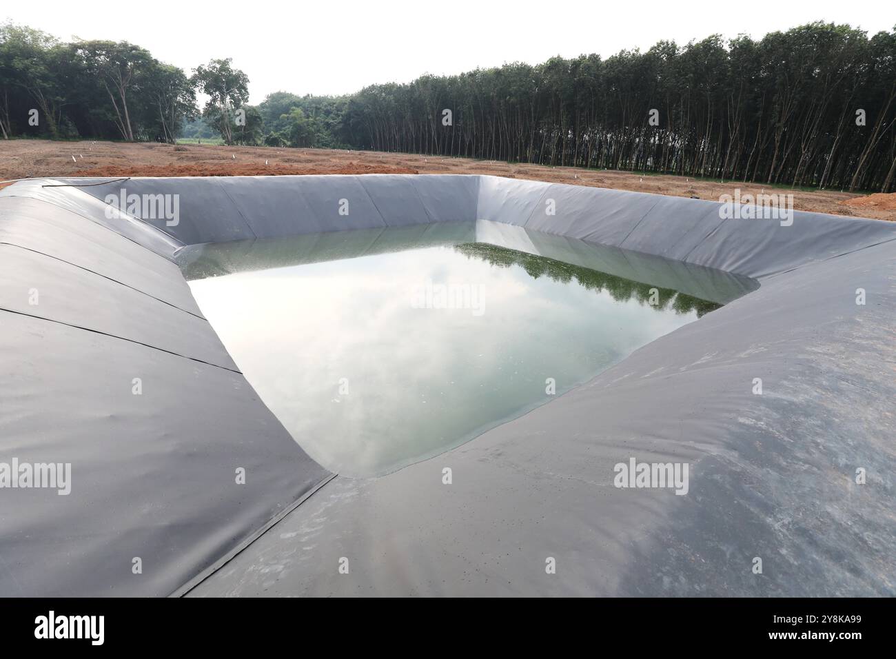 Water reservoir for irrigation in agriculture. Pond for aggregate ...