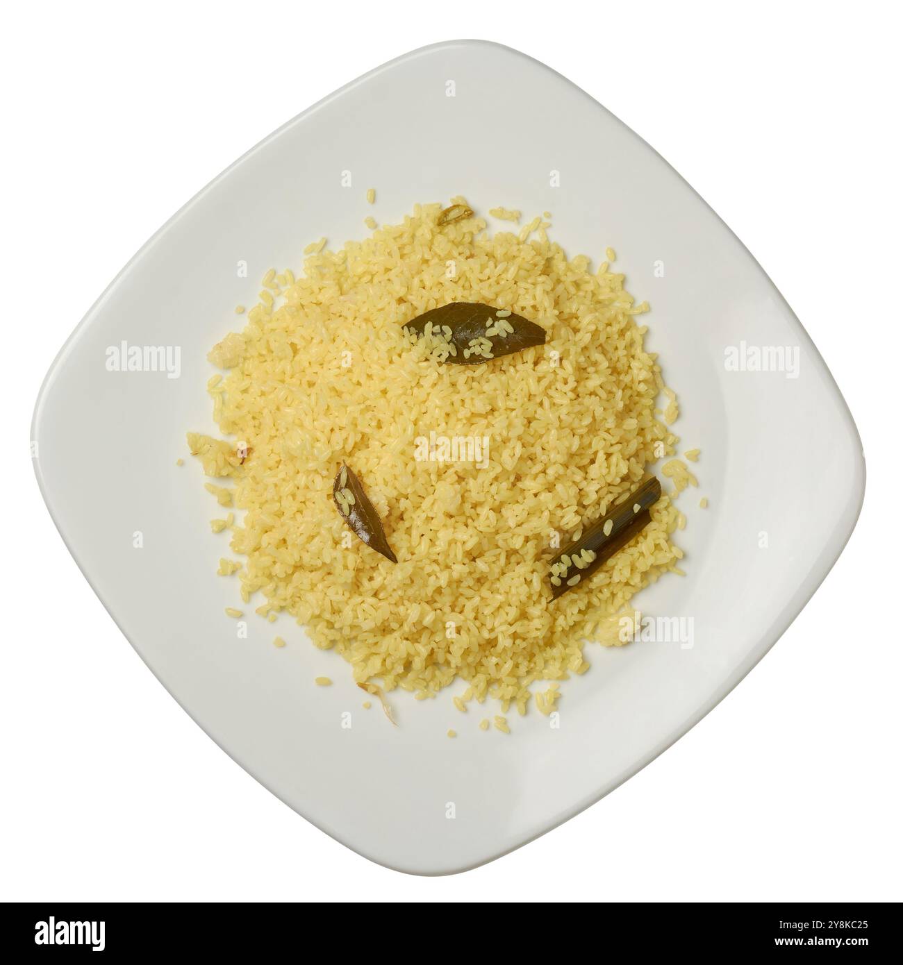plate of cooked yellow colored rice with clarified butter isolated ...