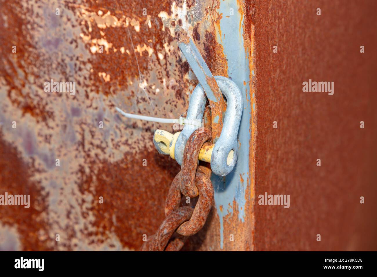 Photograph of an old D Bolt shackle connected to a rusty chain on a ...