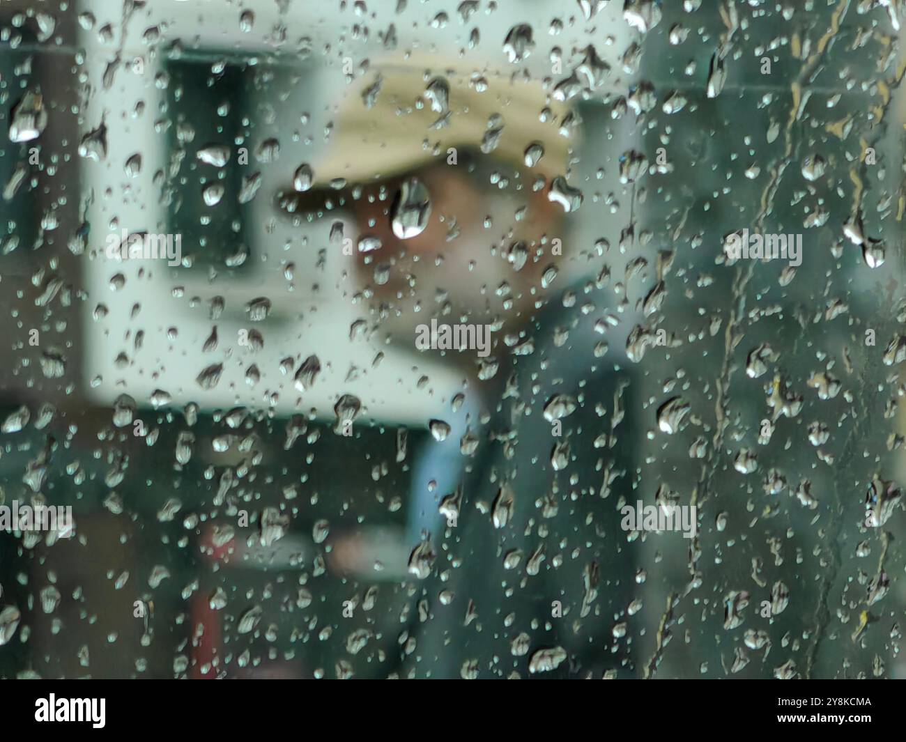 Rainy scene through window raindrops hi-res stock photography and ...