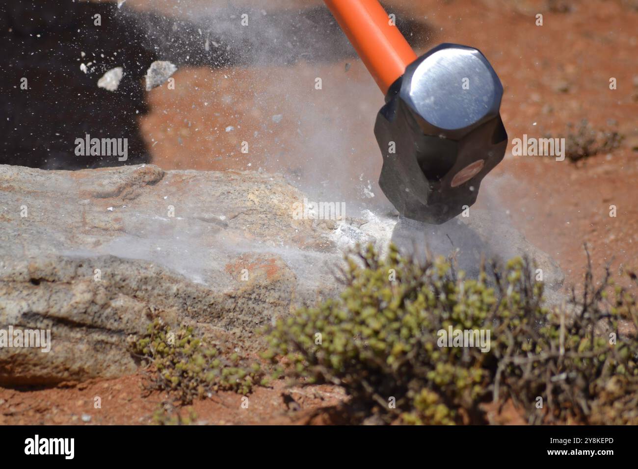 Hammer breaking rock hi-res stock photography and images - Alamy