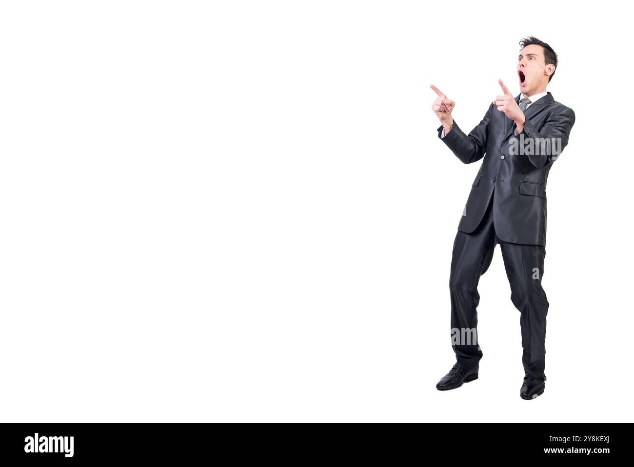 Full body of successful male in formal suit screaming with excitement ...