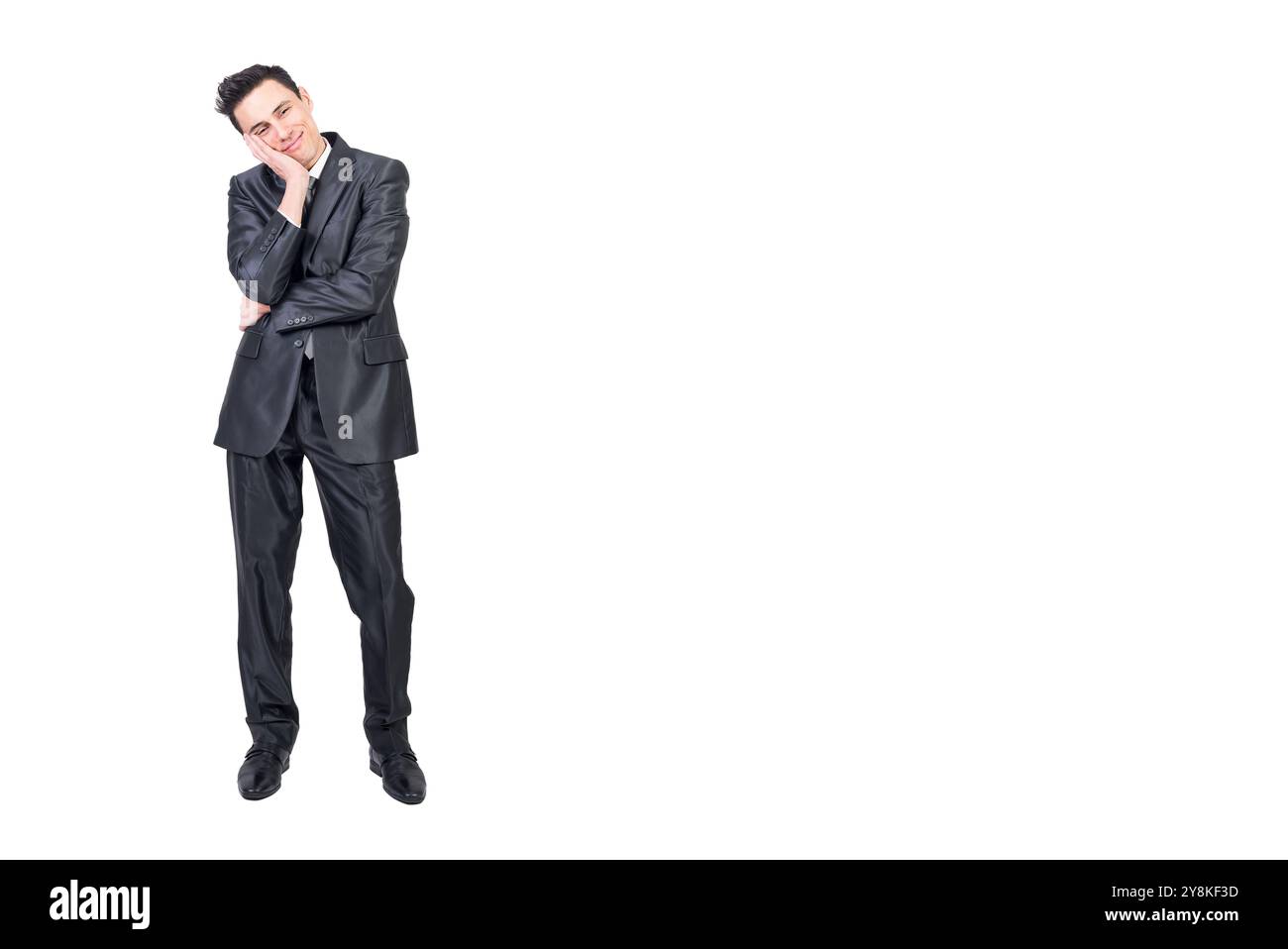 Full body of enamored man in formal suit looking away with dreamy face ...