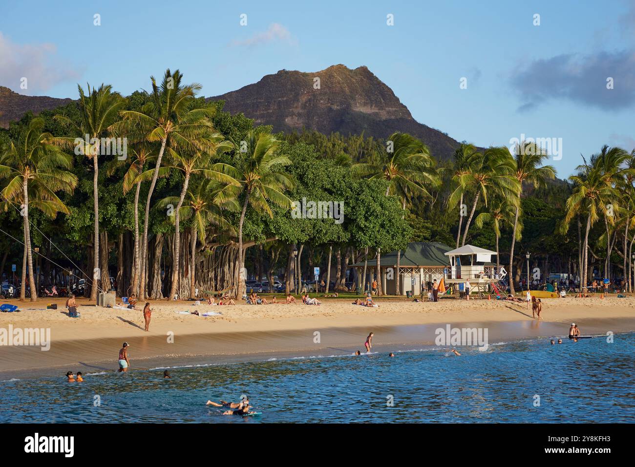 Kapiolani Beach with Diamond Head volcano, surf lifesavers and coconut ...