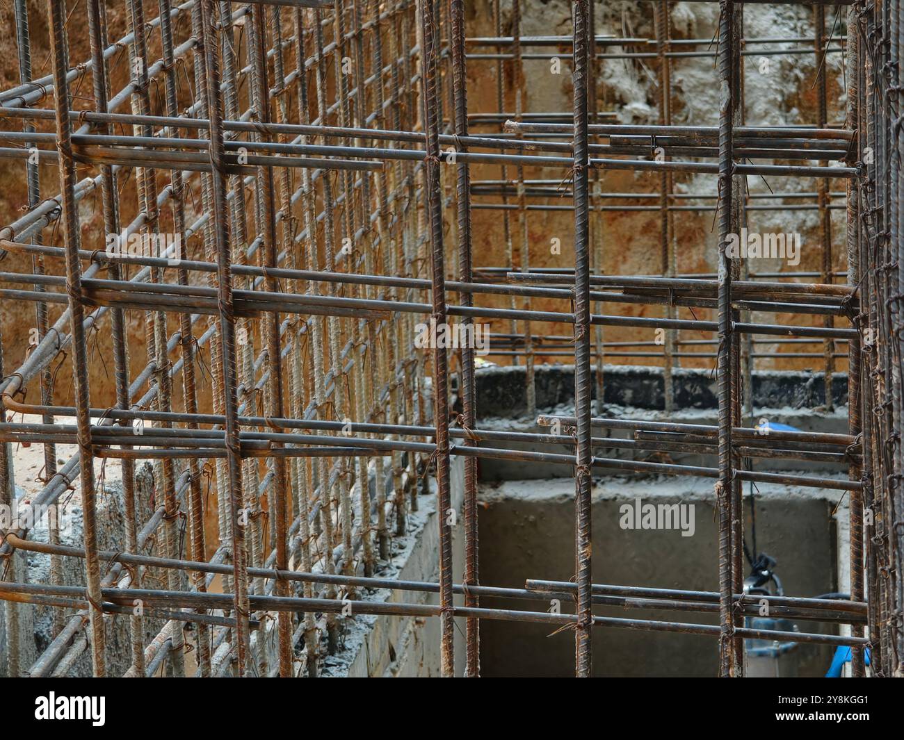 A construction site displaying a reinforced concrete foundation with ...