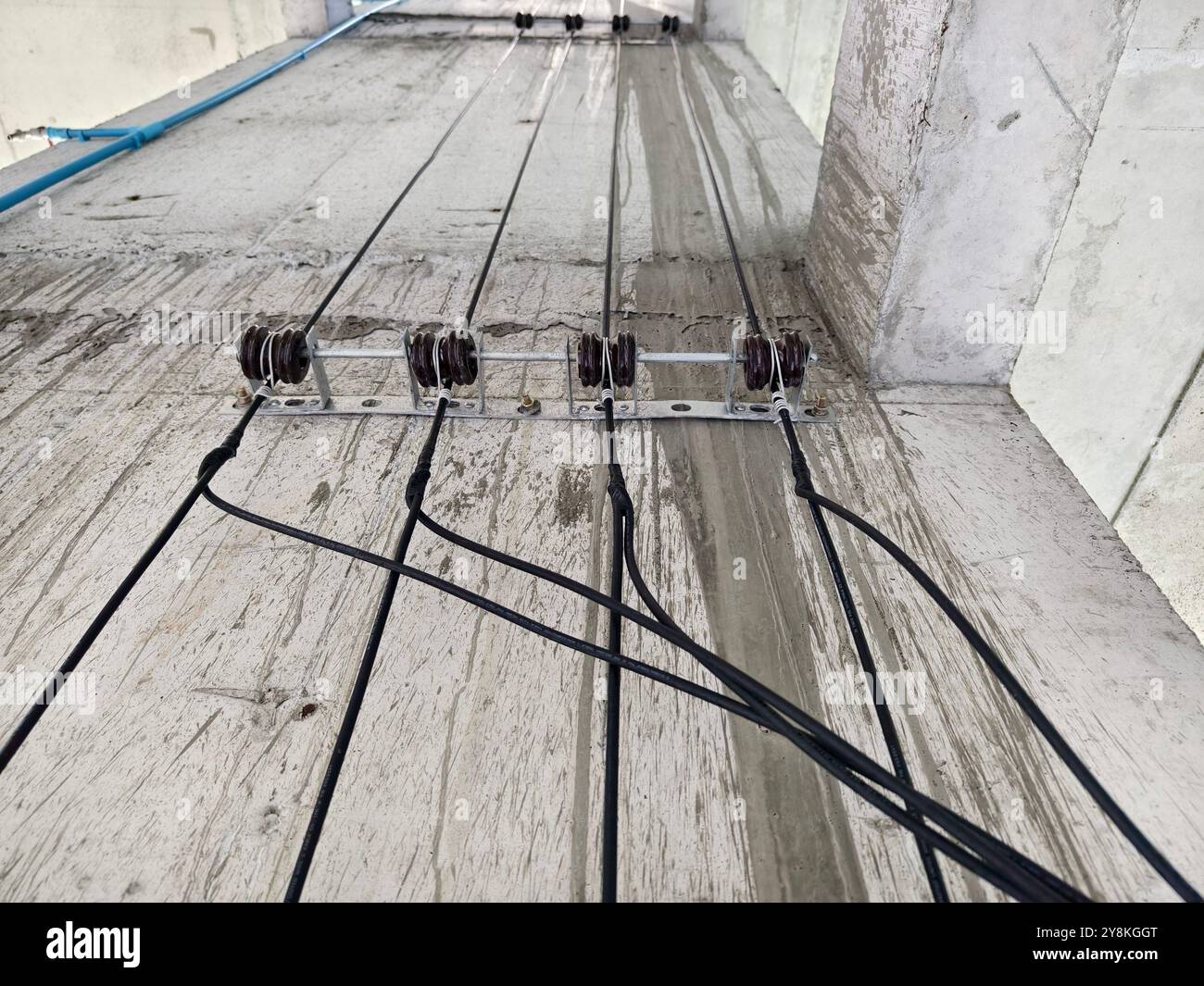 Cables in an elevator shaft at a new building construction site Stock ...
