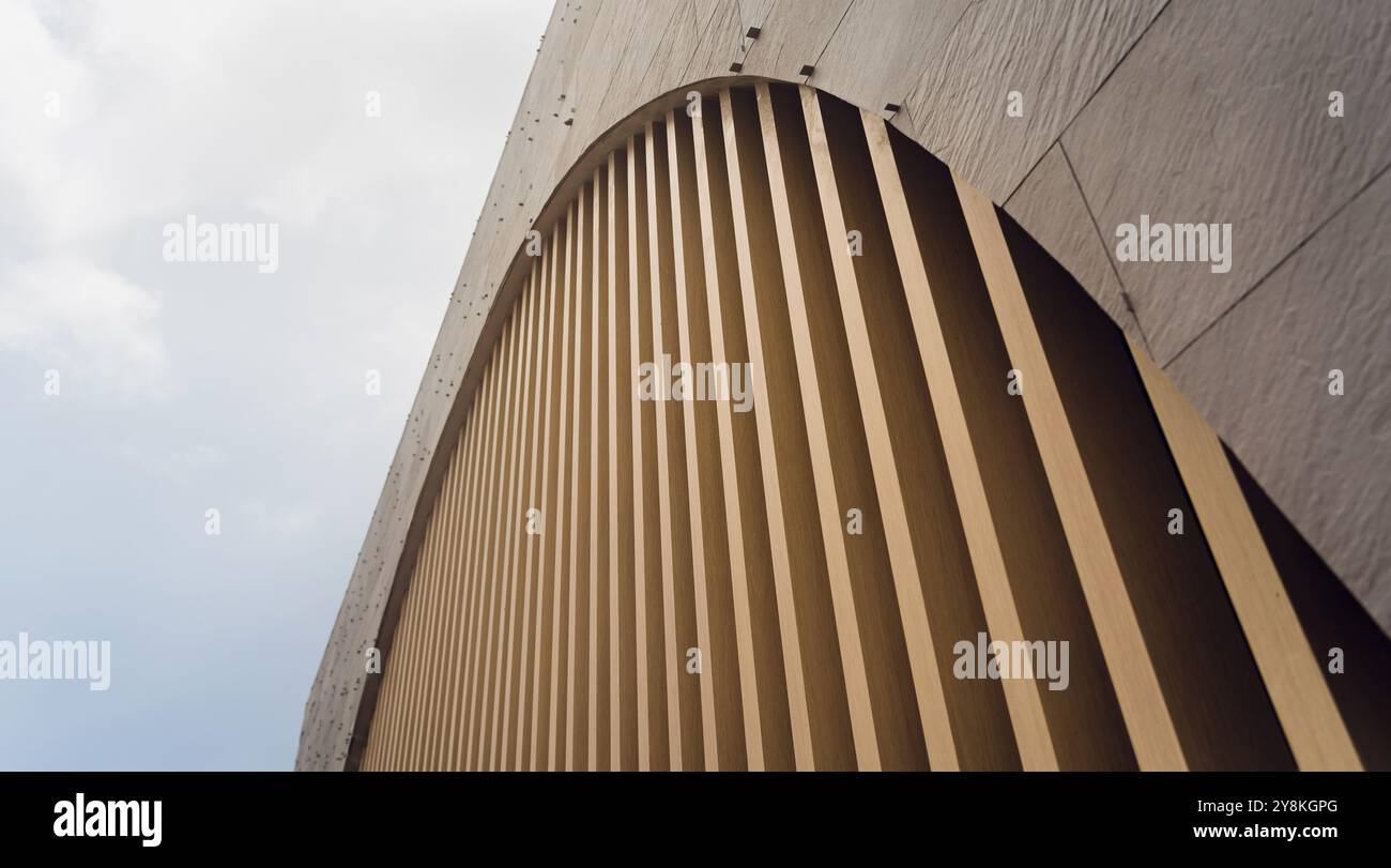 A structure featuring wooden slats on construction site contributing to ...