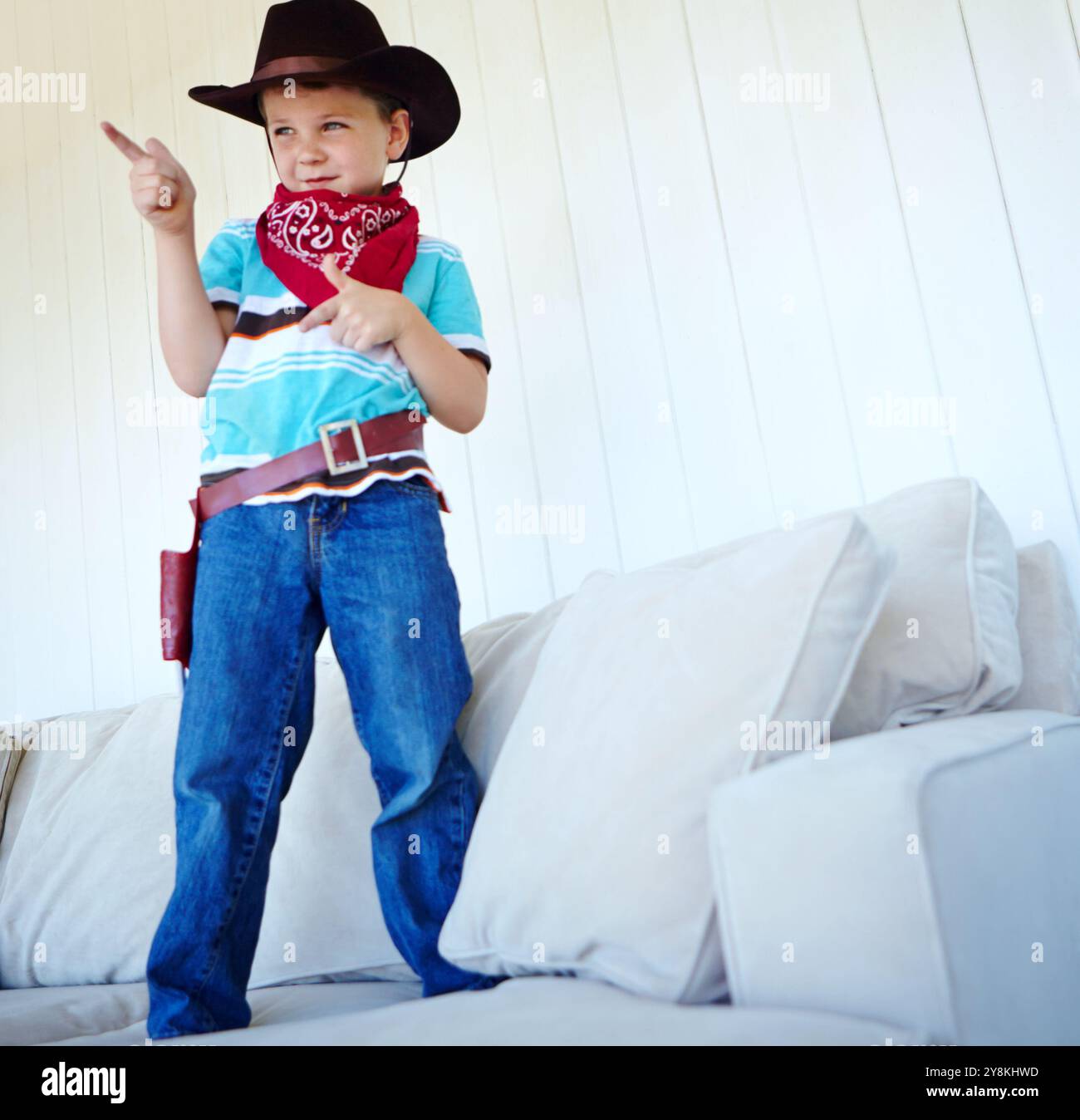 Kid, cowboy and play game with gun gesture for fantasy and creative ...