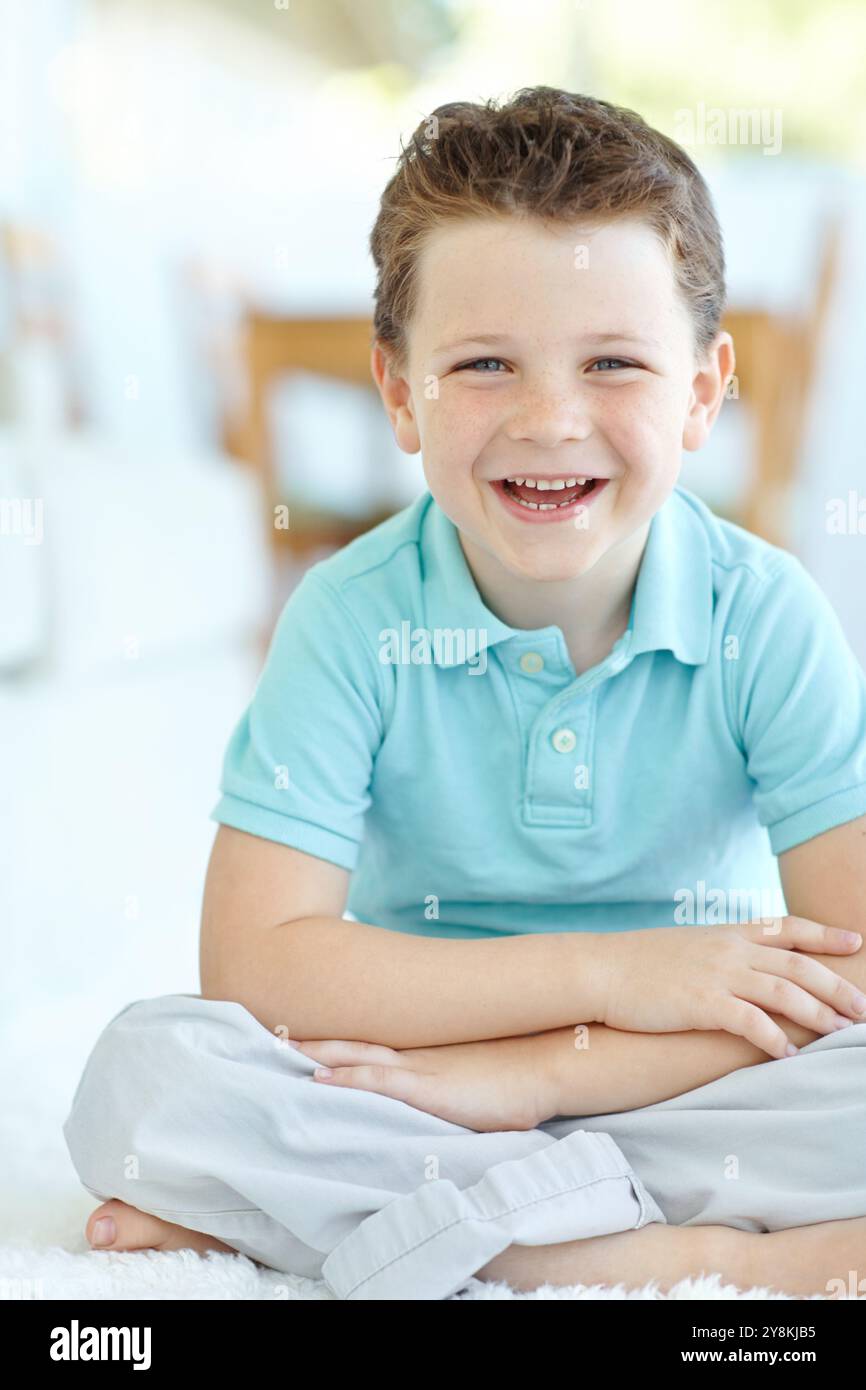 Boy, happy child and laughing in home portrait, morning confidence and ...