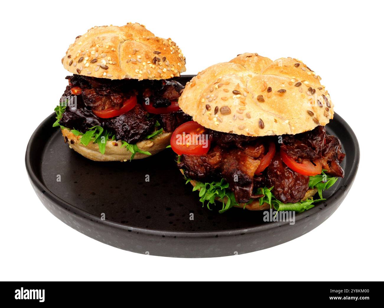 Beef burnt ends sandwich seeded bread rolls with BBQ sauce and salad ...