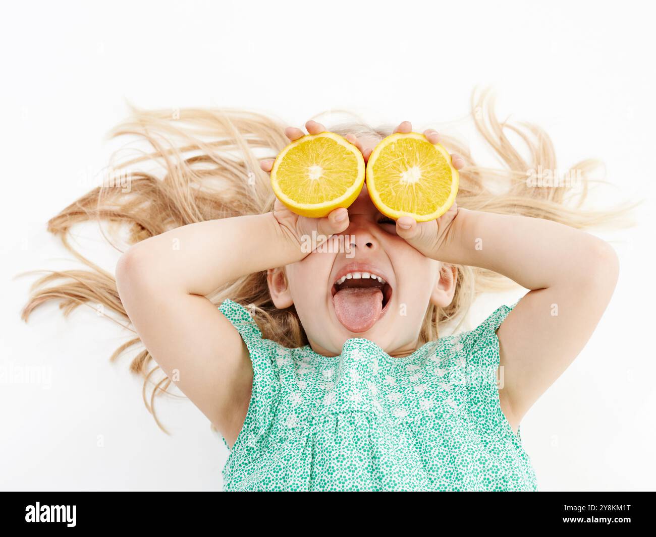 Happy child, lemon or vitamin C with fruit for nutrition, detox or sour ...