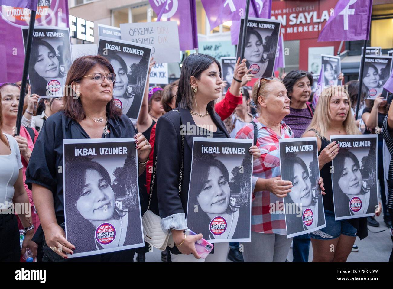 Izmir, Turkey. 05th Oct, 2024. Women hold Ikbal Uzuner's portraits ...