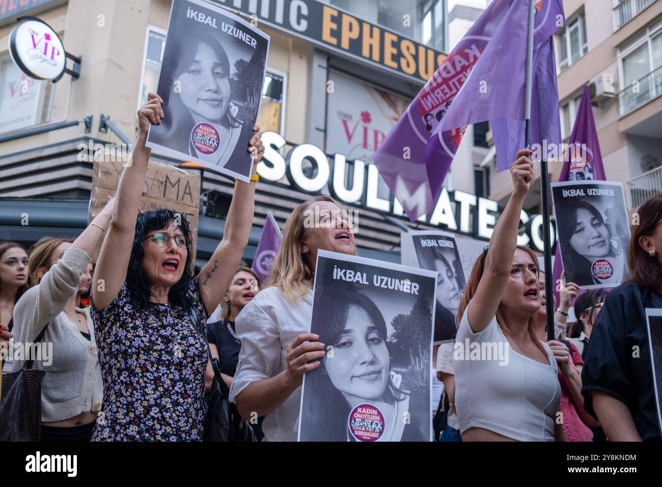 Izmir, Turkey. 05th Oct, 2024. Women hold Ikbal Uzuner's portraits ...