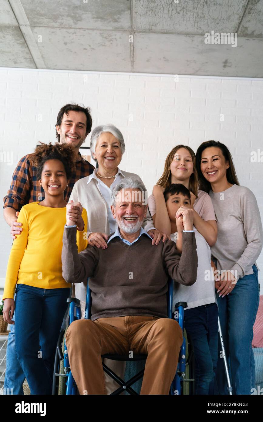 Extended multiethnic diverse family with children,grandparents and parents having fun together ...