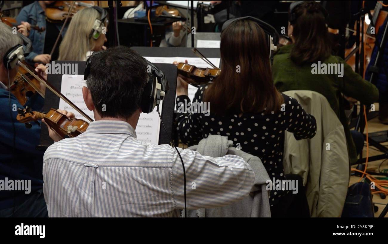 Members if the Royal Philharmonic Orchestra at the Angel Studios in ...