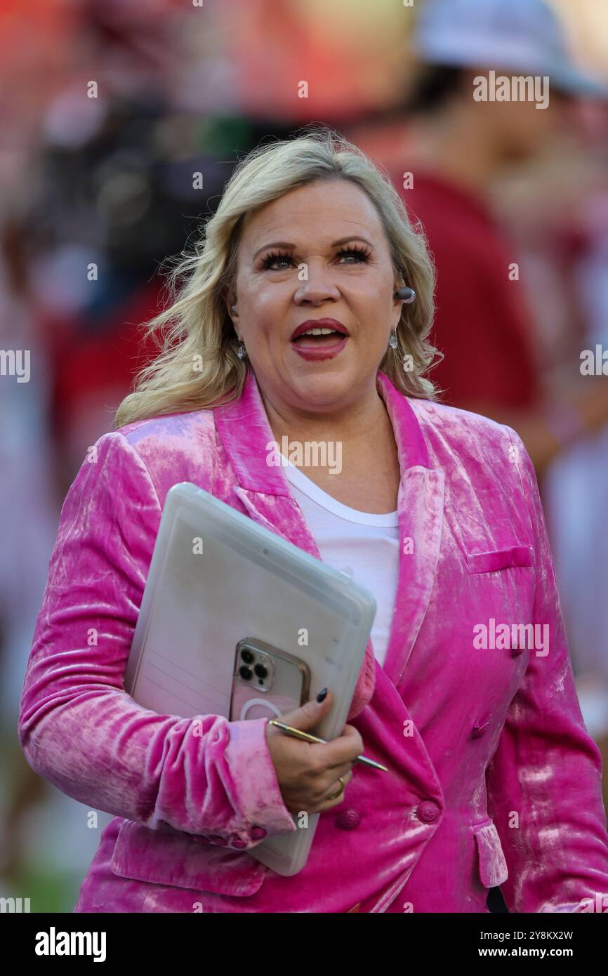 October 5, 2024: ESPN sideline reporter Holly Rowe works her way across ...