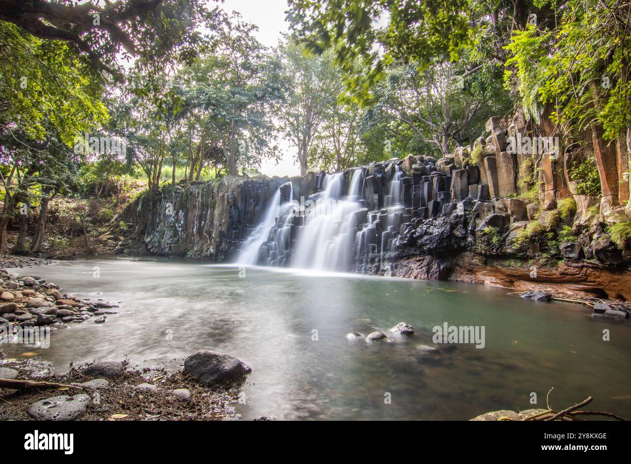 The waterfall is a 10 m high waterfall that cascades over basal steles ...