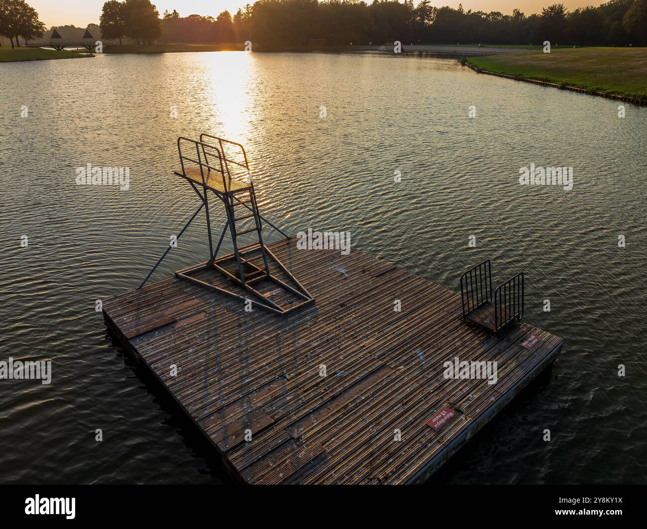 Wooden floating platform by lake at sunset hi-res stock photography and ...