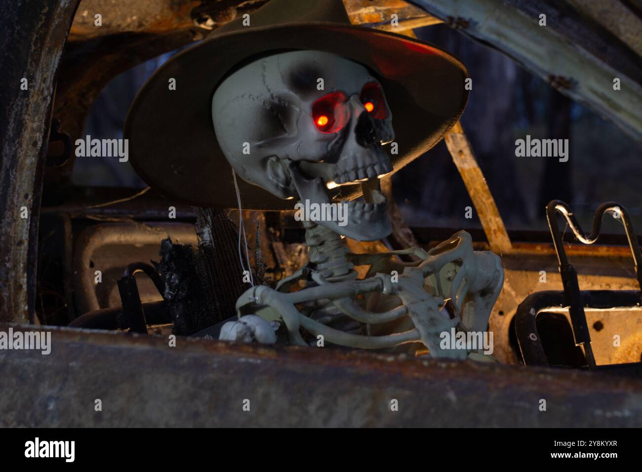 Light painting a replica human skeleton in a wrecked burntout car ...