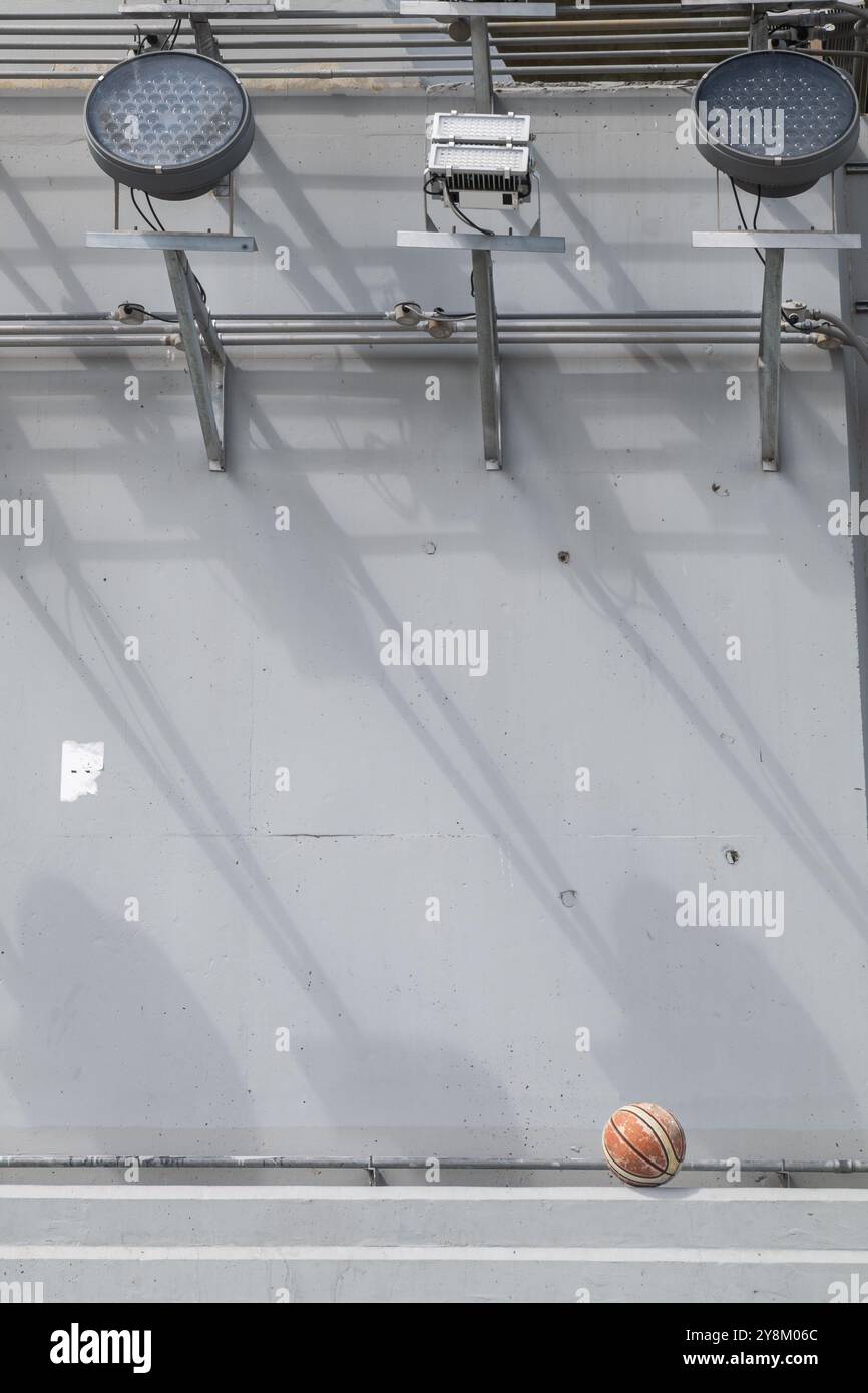Bangkok, Thailand - 28 Sep, 2024 - Old basketball ball on cement floor ...